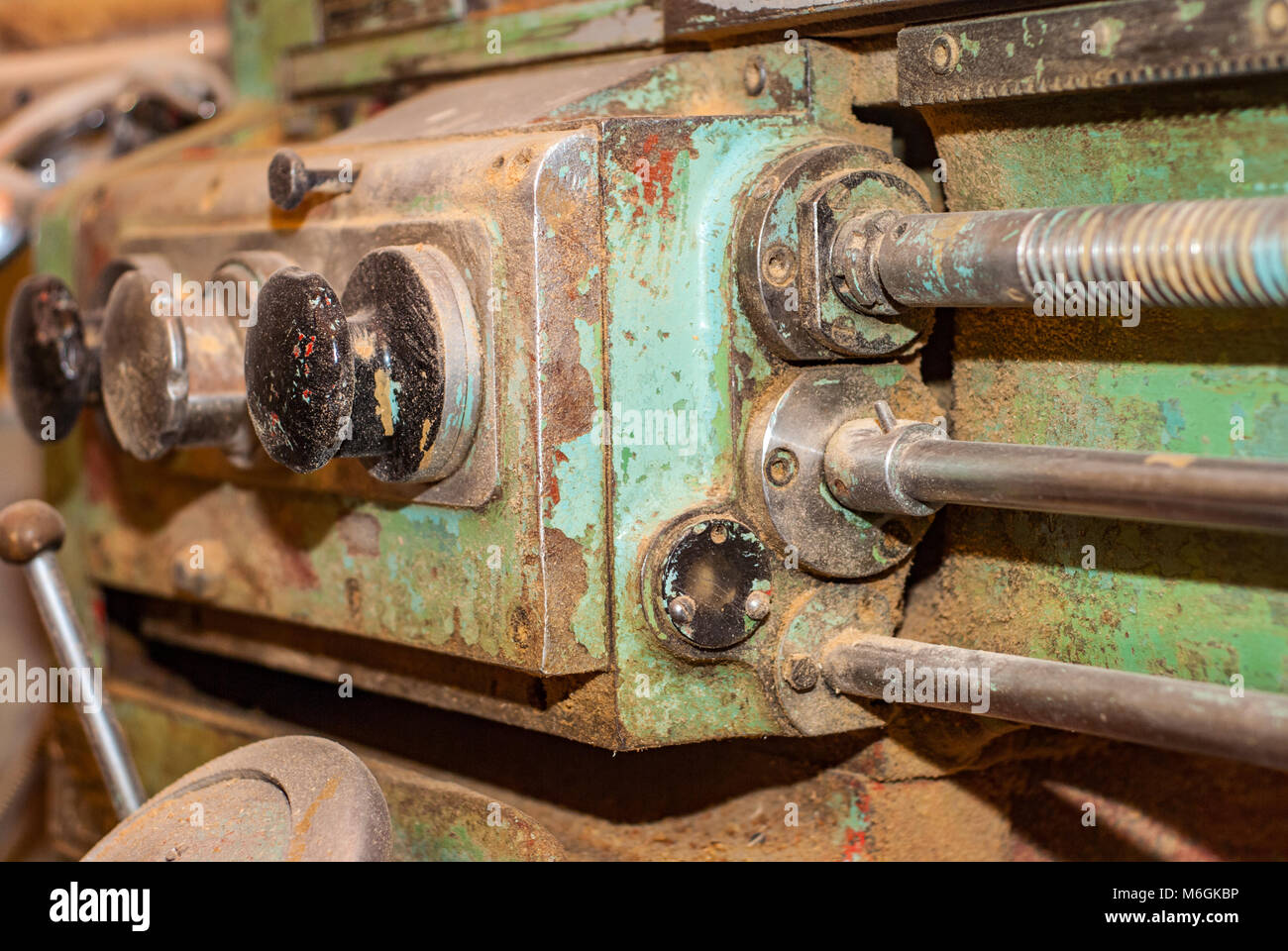 Old metal lathe machine for metalworking in workshop closeup view Stock ...