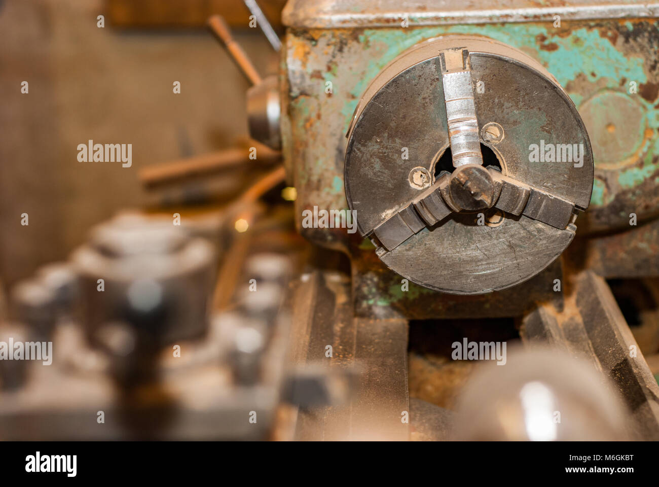 Old metal lathe machine for metalworking in workshop closeup view Stock ...
