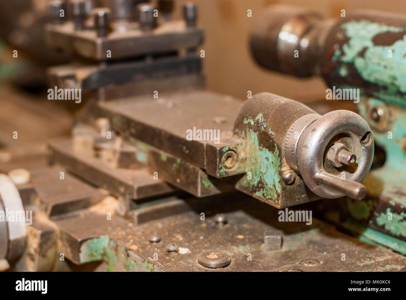 Old metal lathe machine for metalworking in workshop closeup view Stock ...