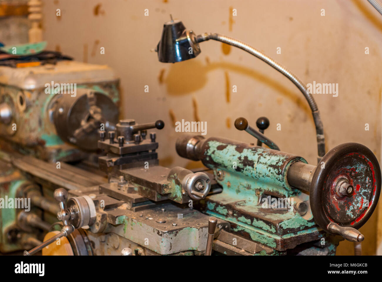 Old metal lathe machine for metalworking in workshop closeup view Stock ...