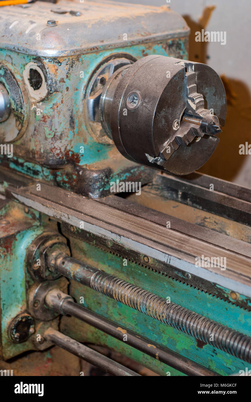 Old metal lathe machine for metalworking in workshop closeup view Stock ...