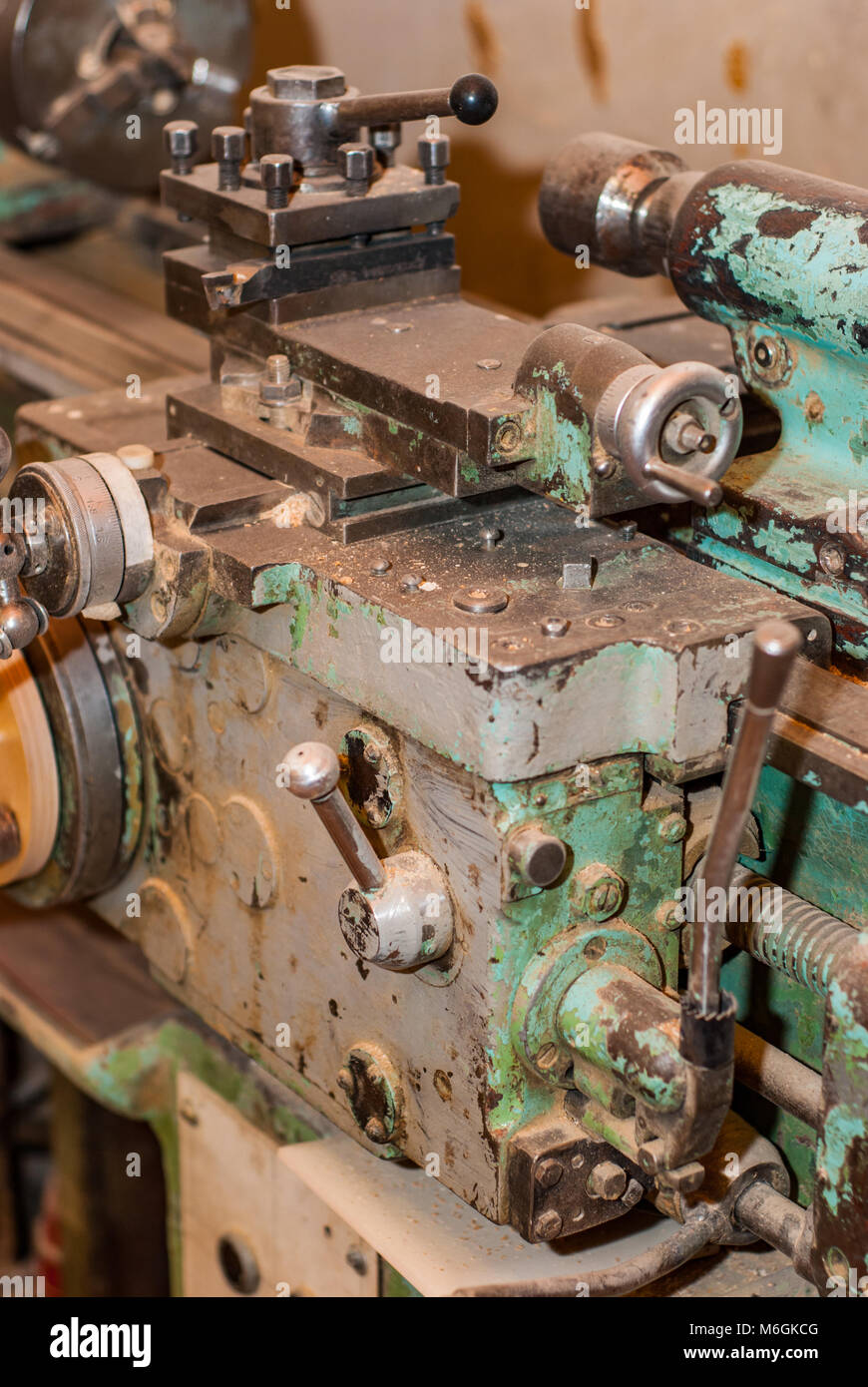 Old metal lathe machine for metalworking in workshop closeup view Stock ...