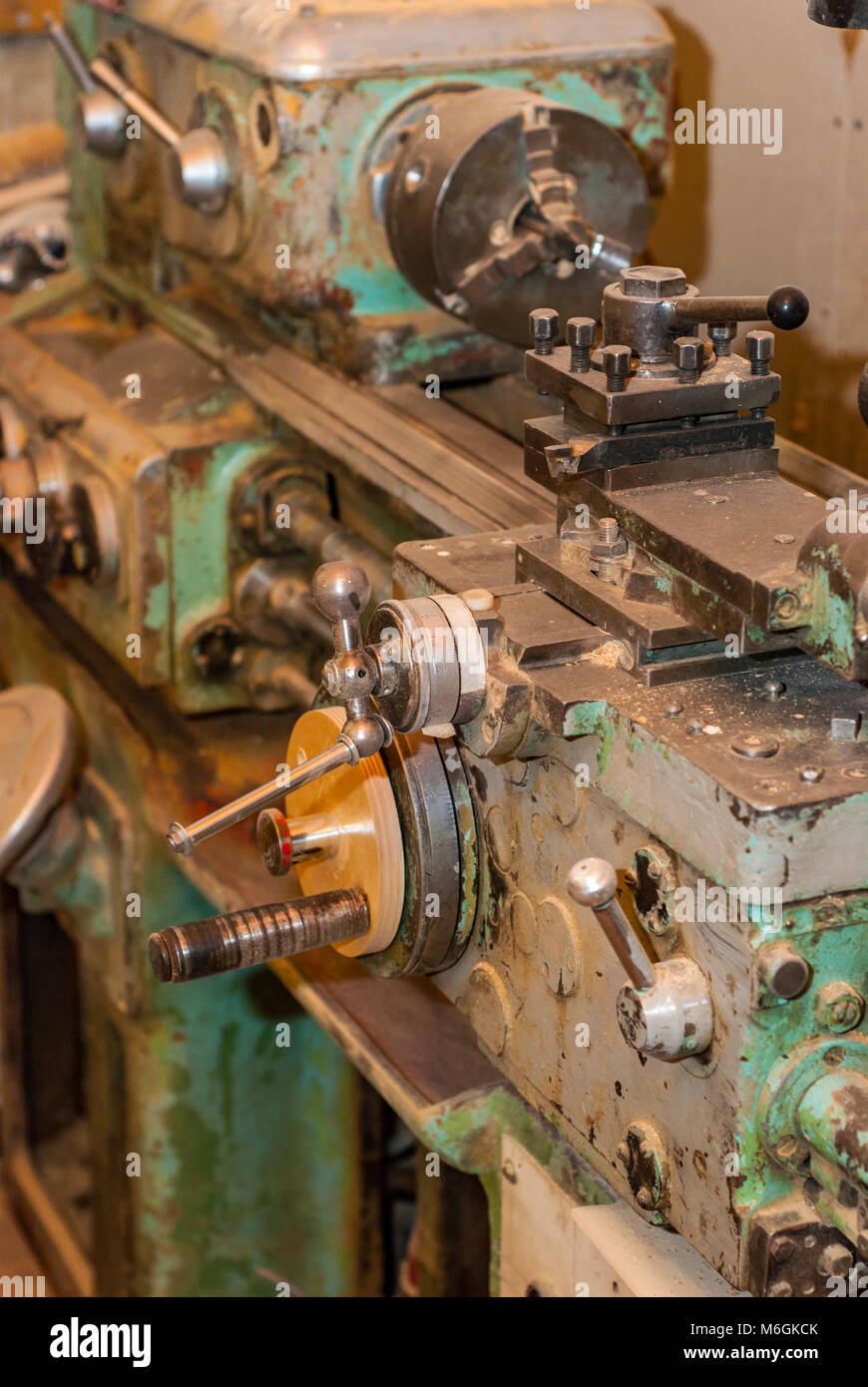 Old metal lathe machine for metalworking in workshop closeup view Stock ...
