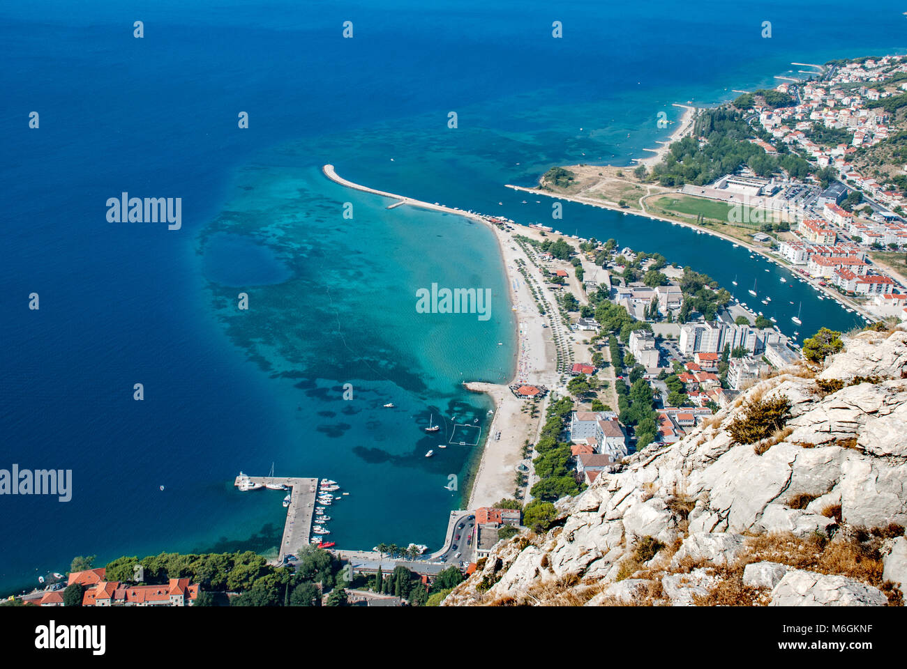 Aerial view of sandy beach. View of Omis from the mountain. Omis ...