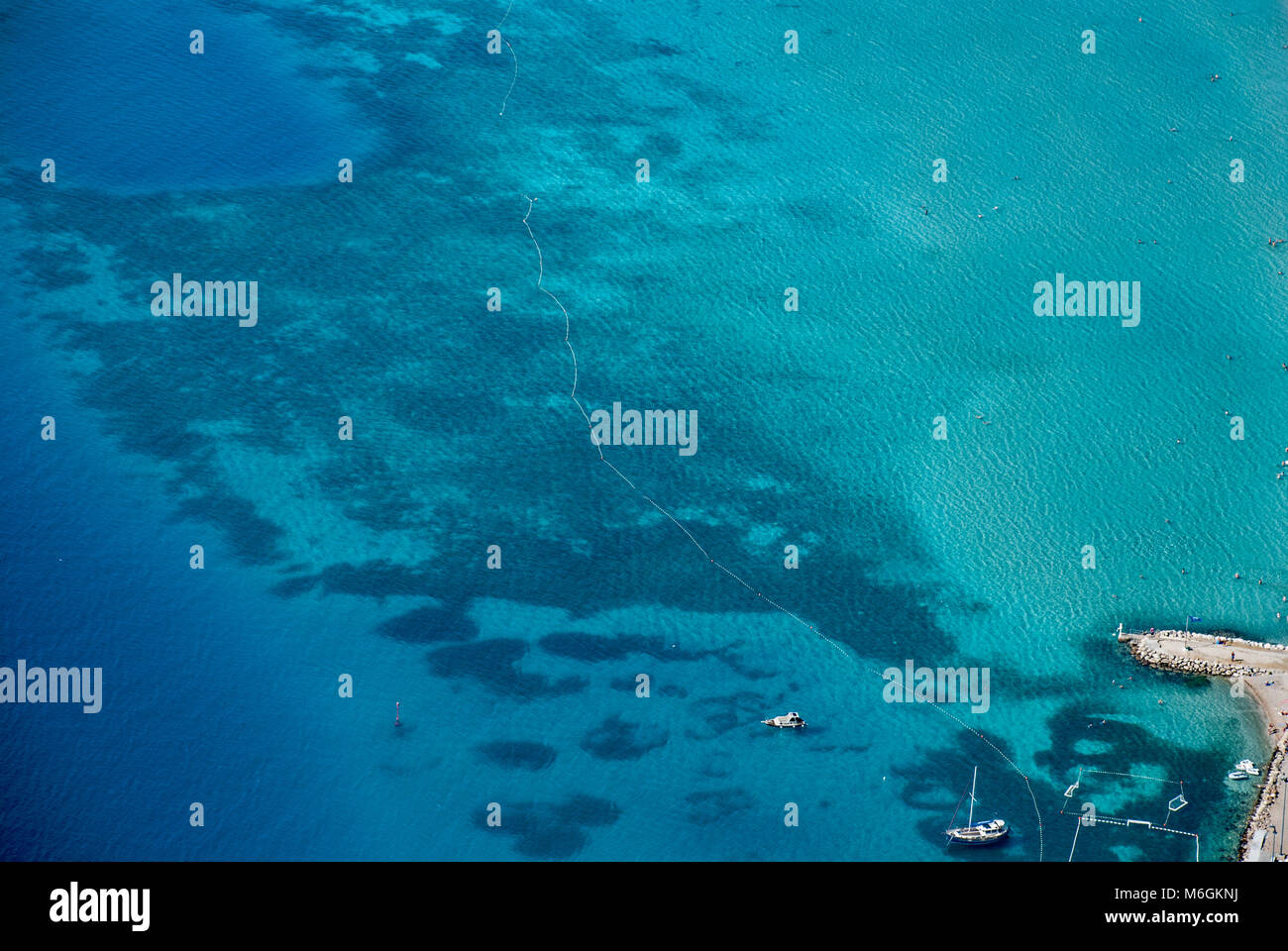 Aerial view of the shallow sea. View of Omis beach from the fortress on ...