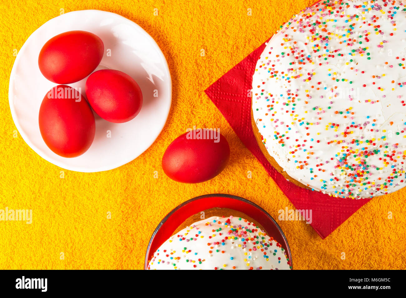 Kulichi, traditional Russian Easter cake with icing and dyed eggs Stock ...