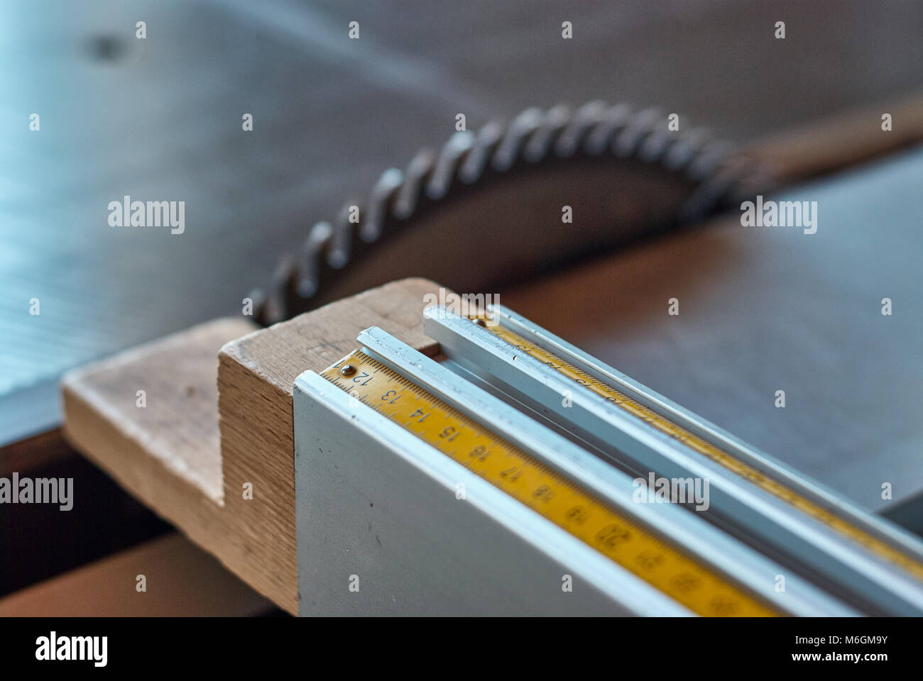 Measuring scale with a stopper on the panel squaring saw Stock Photo ...