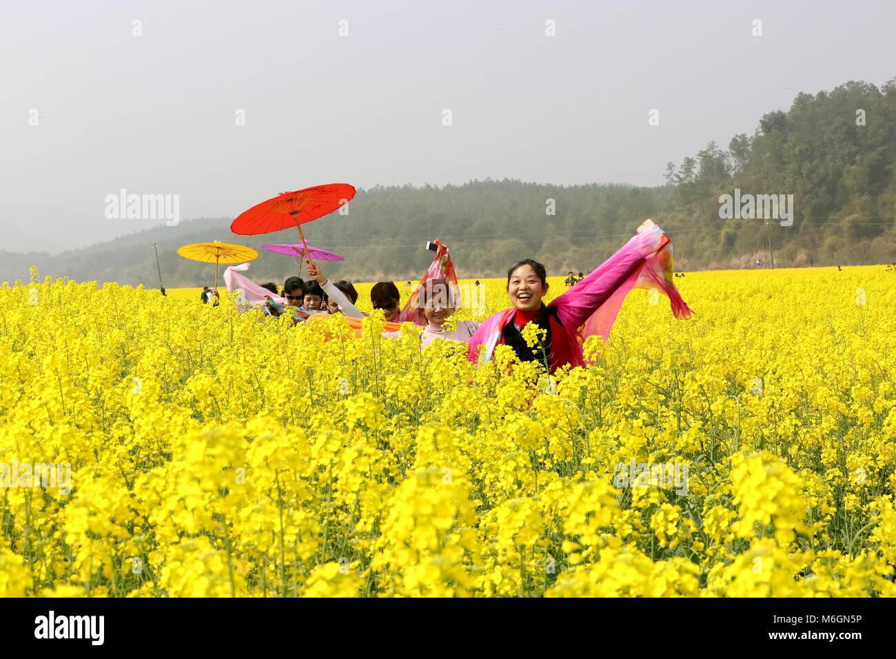 Jishui, China's Jiangxi Province. 3rd Mar, 2018. Tourists pose for ...