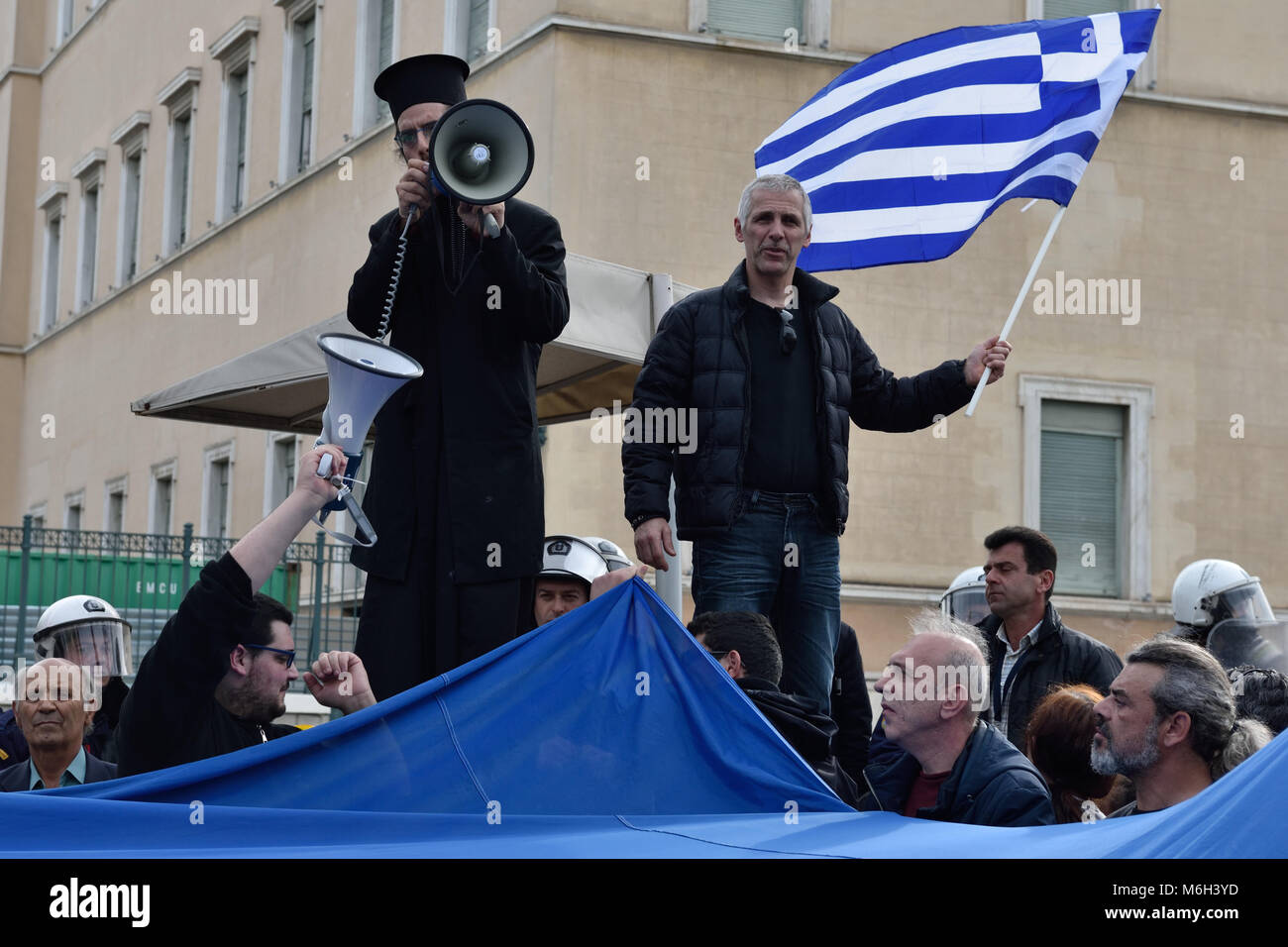 Greek orthodox in front riot hi-res stock photography and images - Alamy