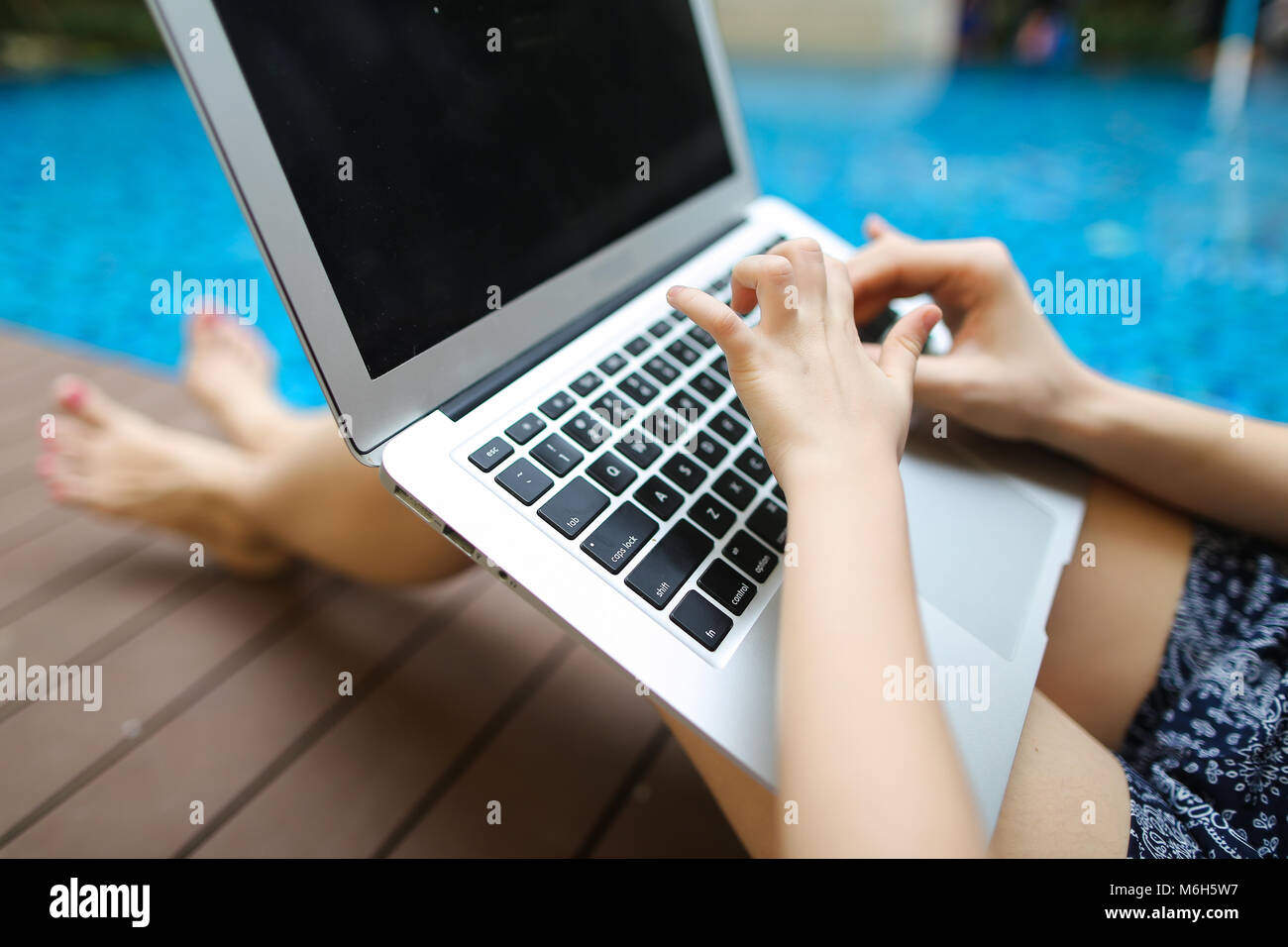 close up mother and daughter hands pressing keyboard on laptop s Stock ...