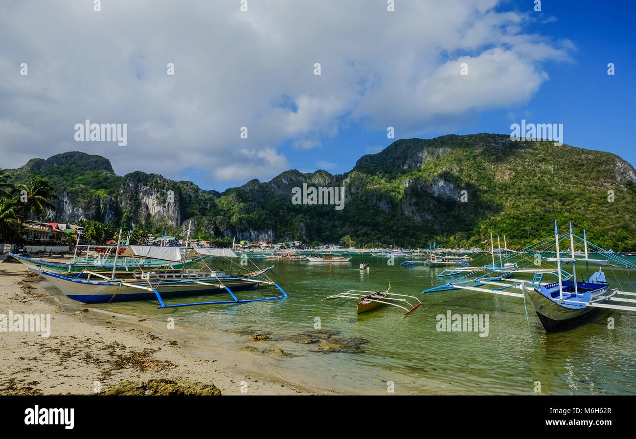 Palawan, Philippines - Apr 6, 2017. Wooden boats docking on sea in ...