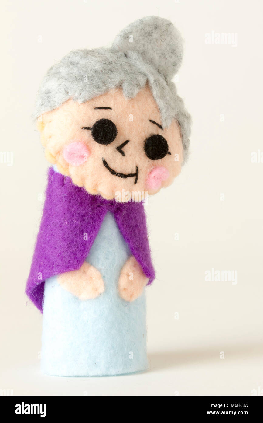 The od lady's puppet with a smiling face Stock Photo - Alamy