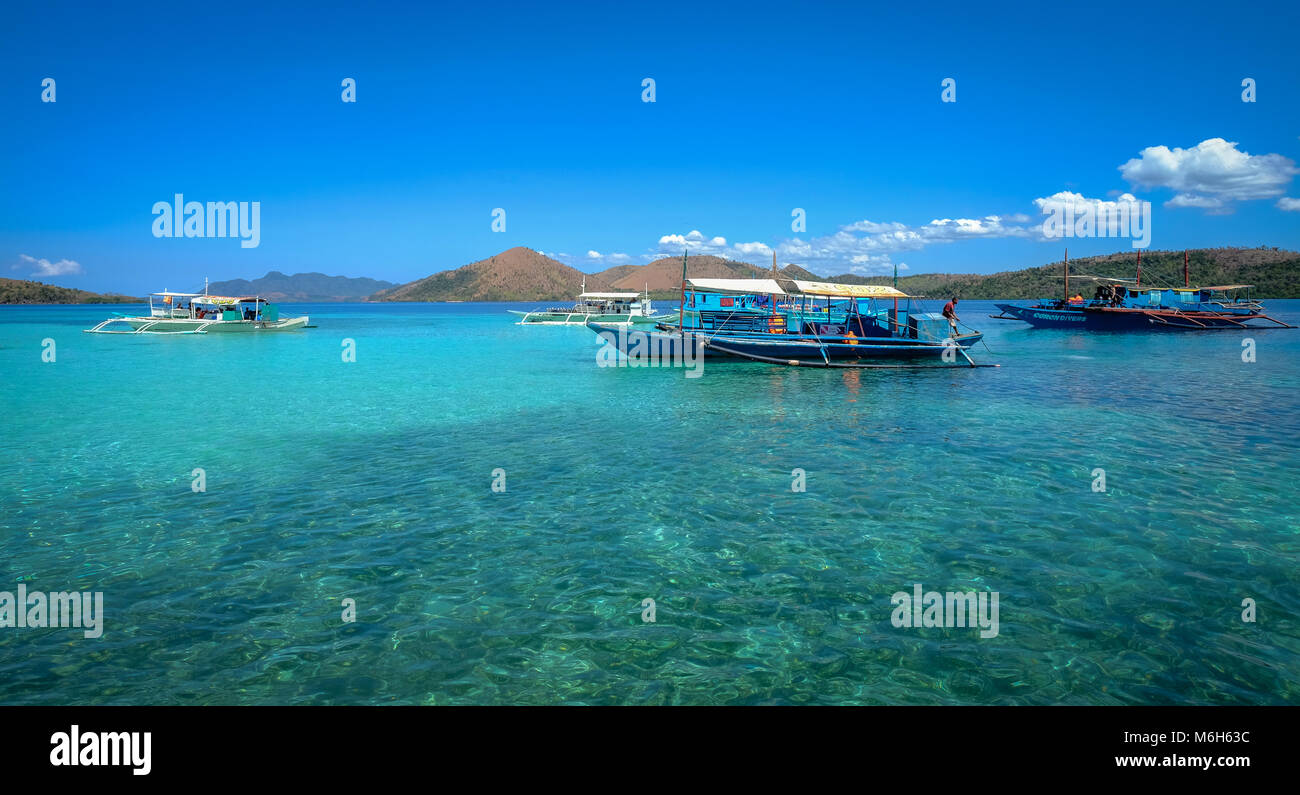 Coron, Philippines - Apr 10, 2017. Tourist boats on sea in Coron Island ...