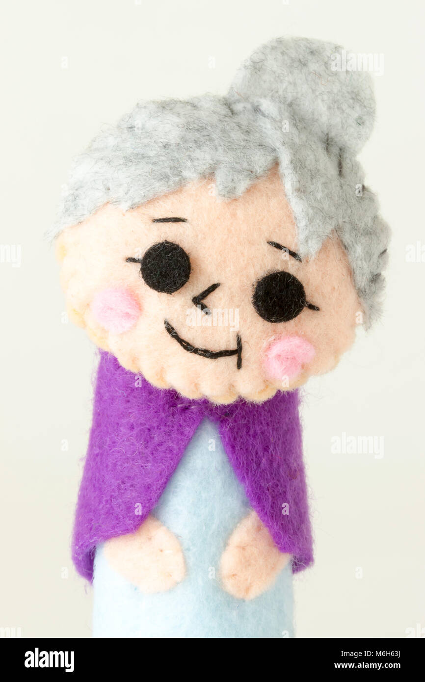 The od lady's puppet with a smiling face Stock Photo - Alamy