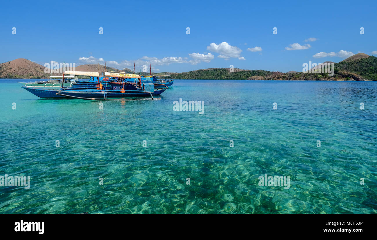 Coron, Philippines - Apr 10, 2017. Tourist boats on sea in Coron Island ...