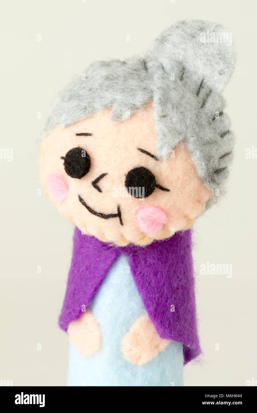 The od lady's puppet with a smiling face Stock Photo - Alamy