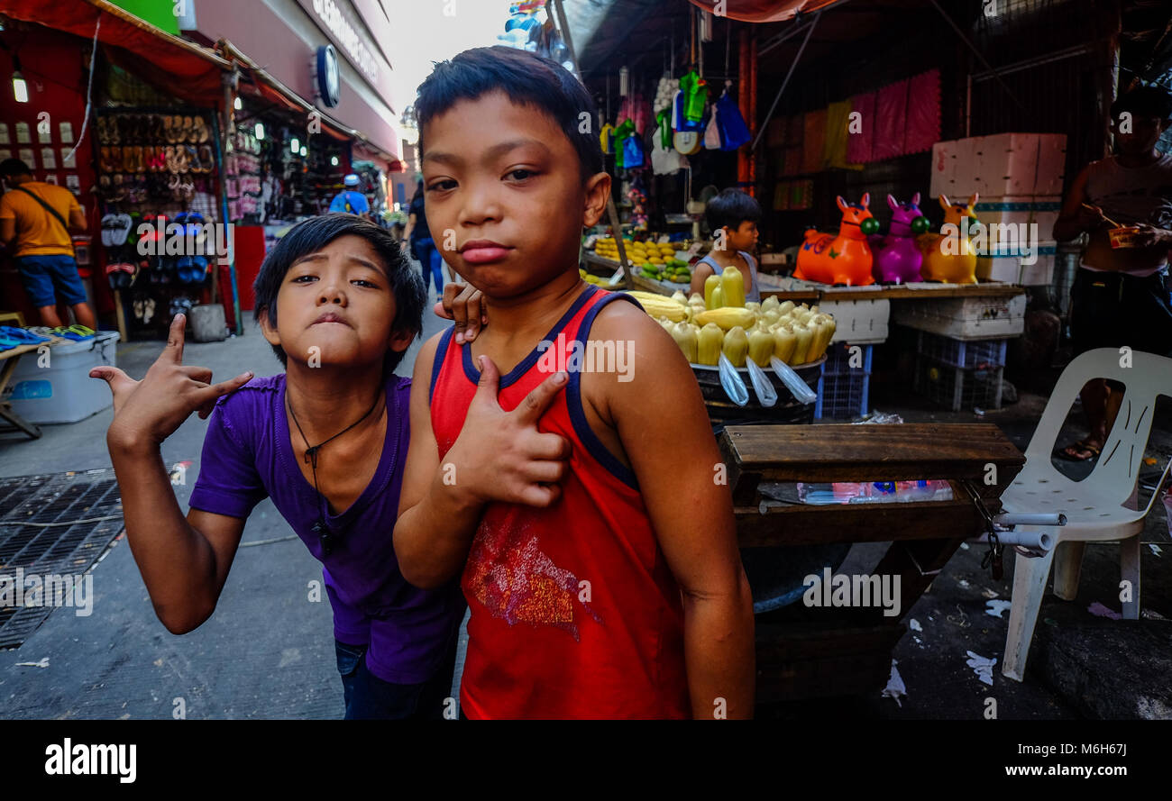 Street children in manila play hi-res stock photography and images - Alamy