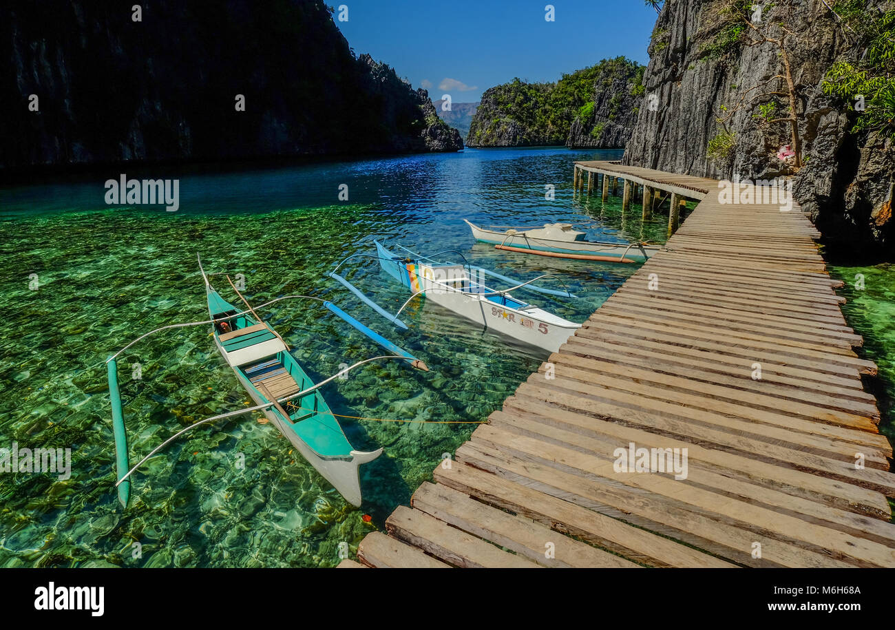 Palawan, Philippines - Apr 11, 2017. Small boats at pier in Palawan ...