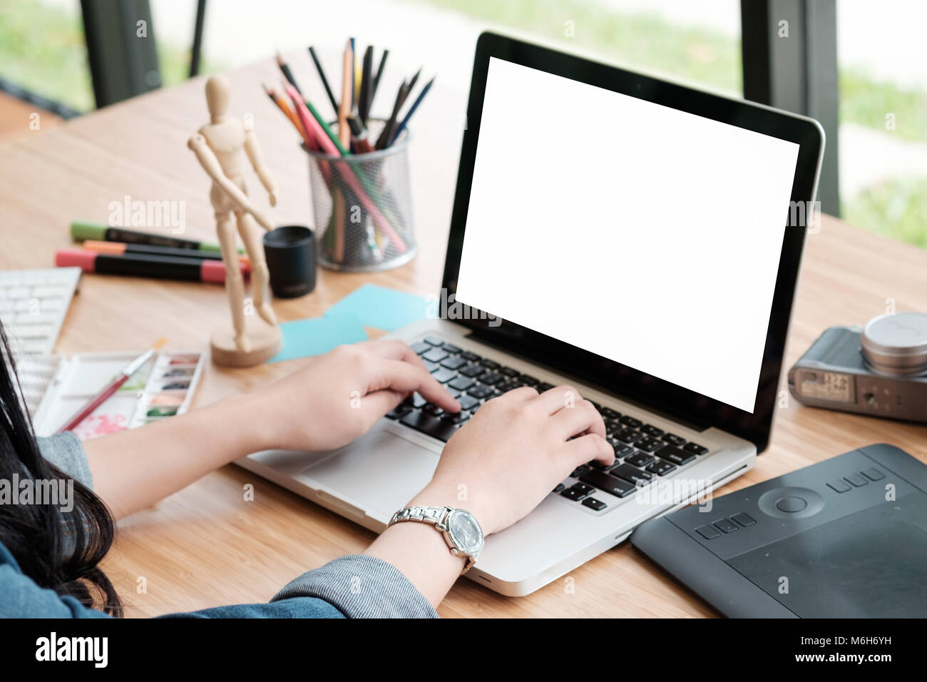 Hands using computer laptop with empty screen Stock Photo - Alamy