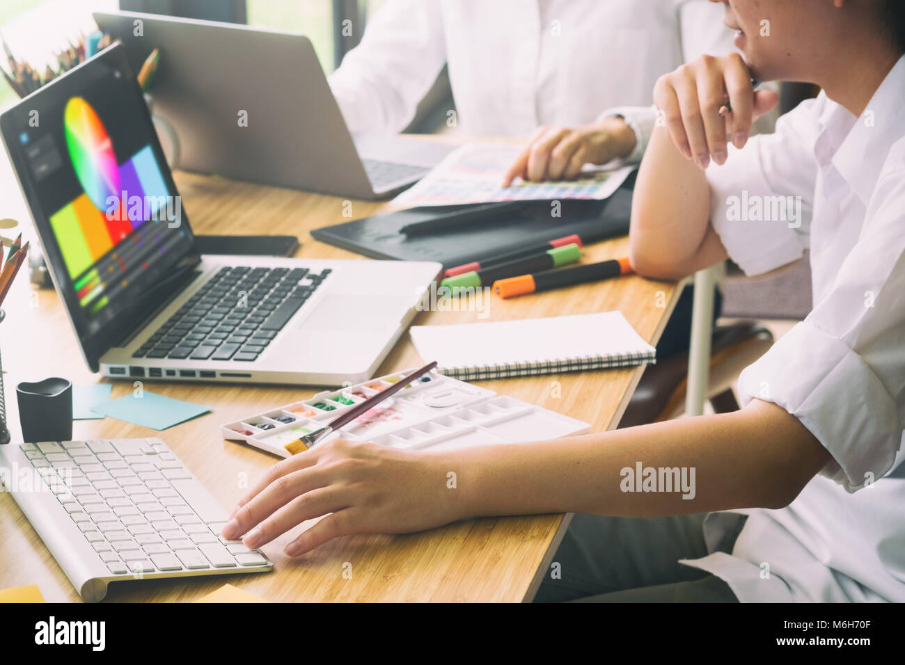 Cropped shot of Creative graphic design team working in office Stock ...