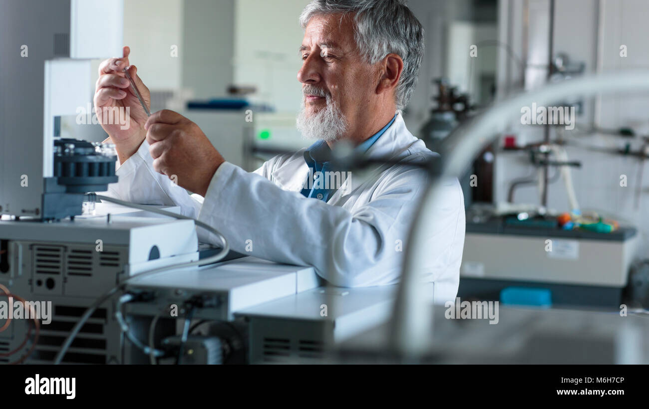 Senior chemistry professor/doctor in a lab (color toned image Stock ...