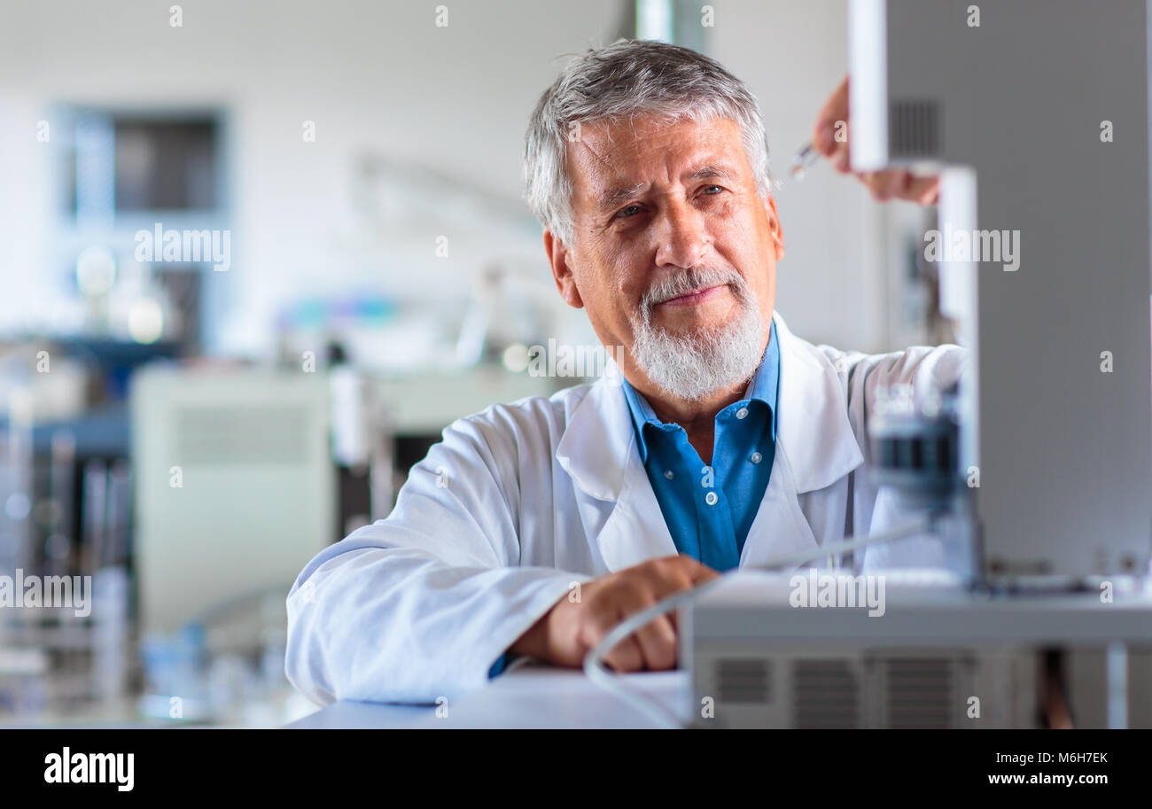 Senior chemistry professor/doctor in a lab (color toned image Stock ...