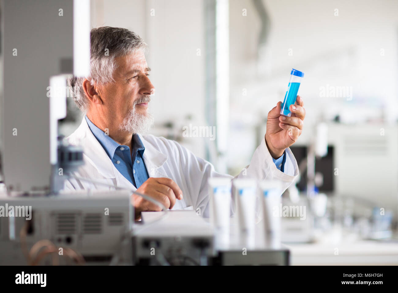 Senior chemistry professor/doctor in a lab (color toned image Stock ...