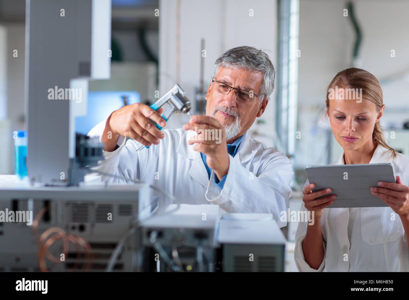 Senior chemistry professor/doctor in a lab (color toned image Stock ...