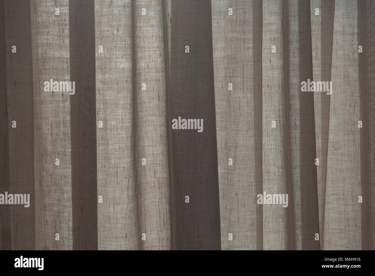 Sunlight behind the blinds and the curtain by the window Stock Photo ...