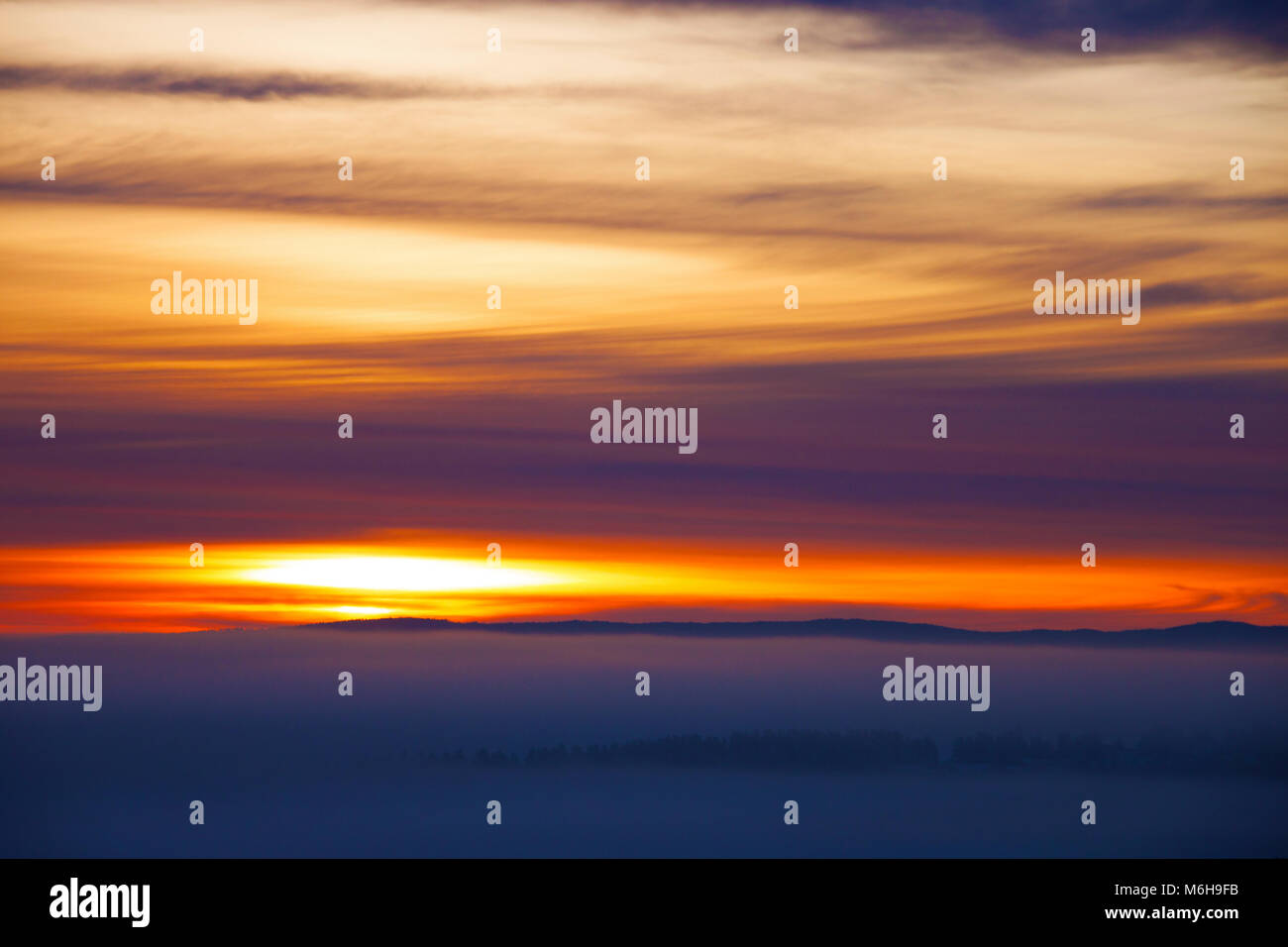 Beautiful sunrise in the horizon Stock Photo - Alamy