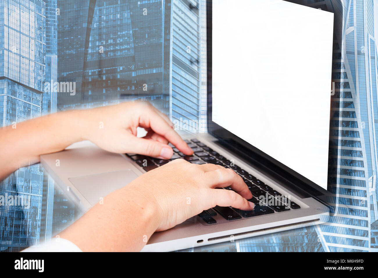 hands on laptop keyboard Stock Photo - Alamy