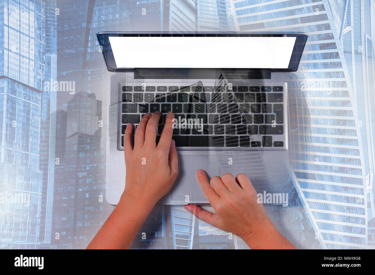 hands on laptop keyboard Stock Photo - Alamy