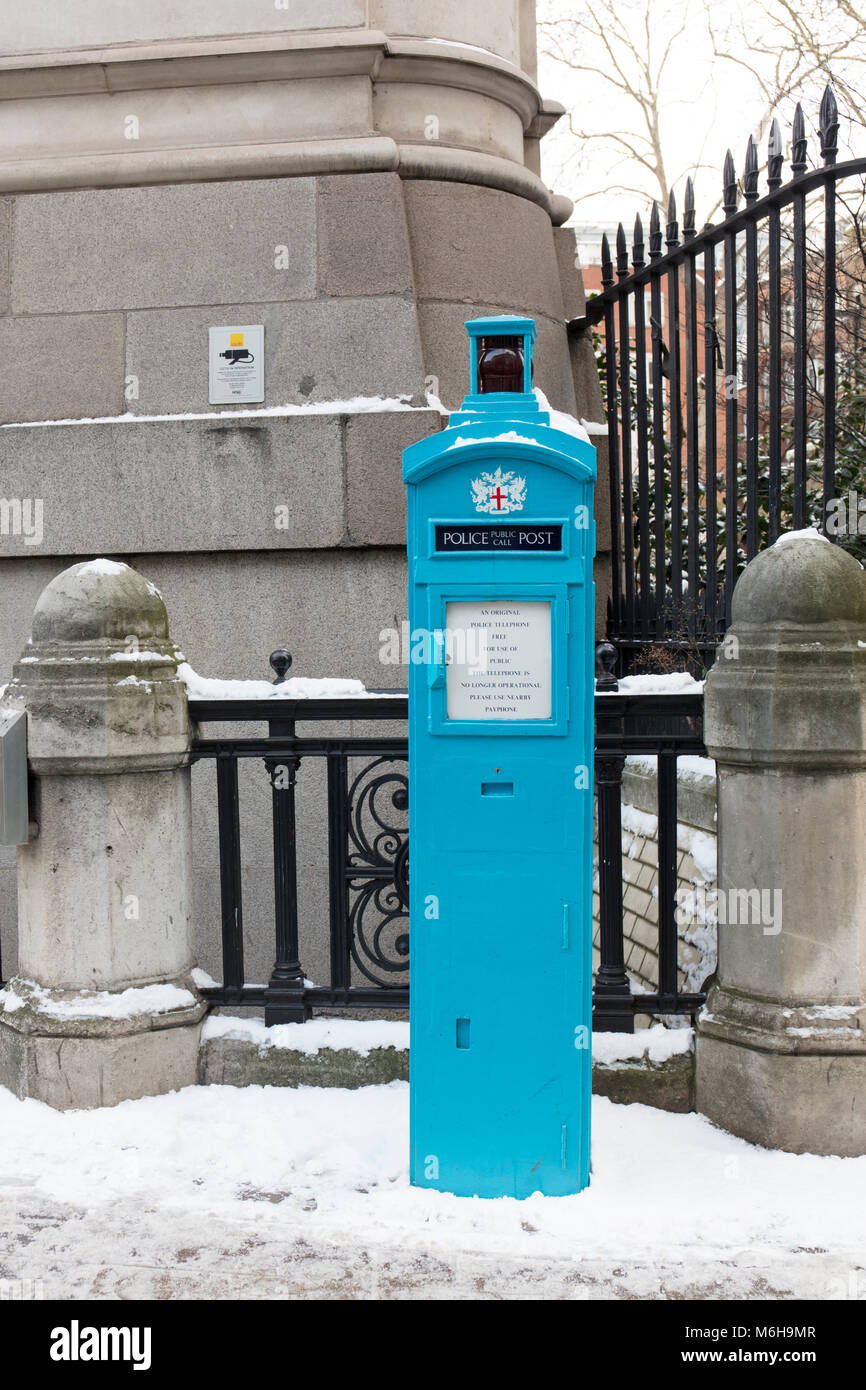 A vintage blue Police phone box in the snow, in London Stock Photo - Alamy