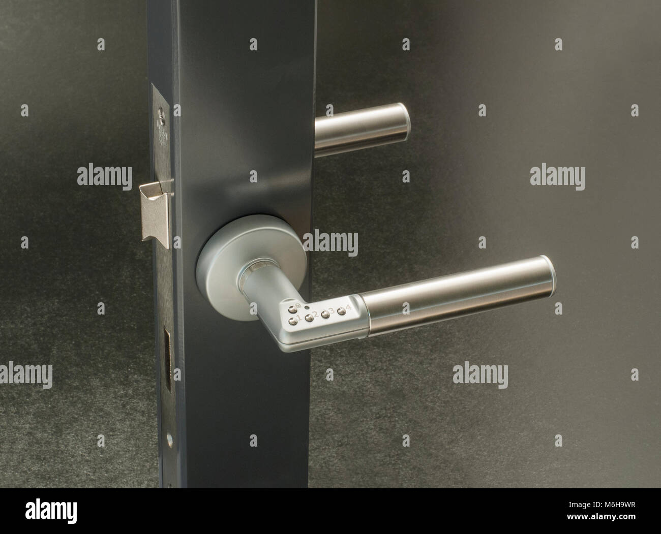 Door handle with digital code access Stock Photo - Alamy