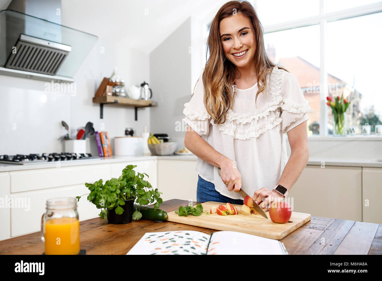 Woman Cooking In The Kitchen