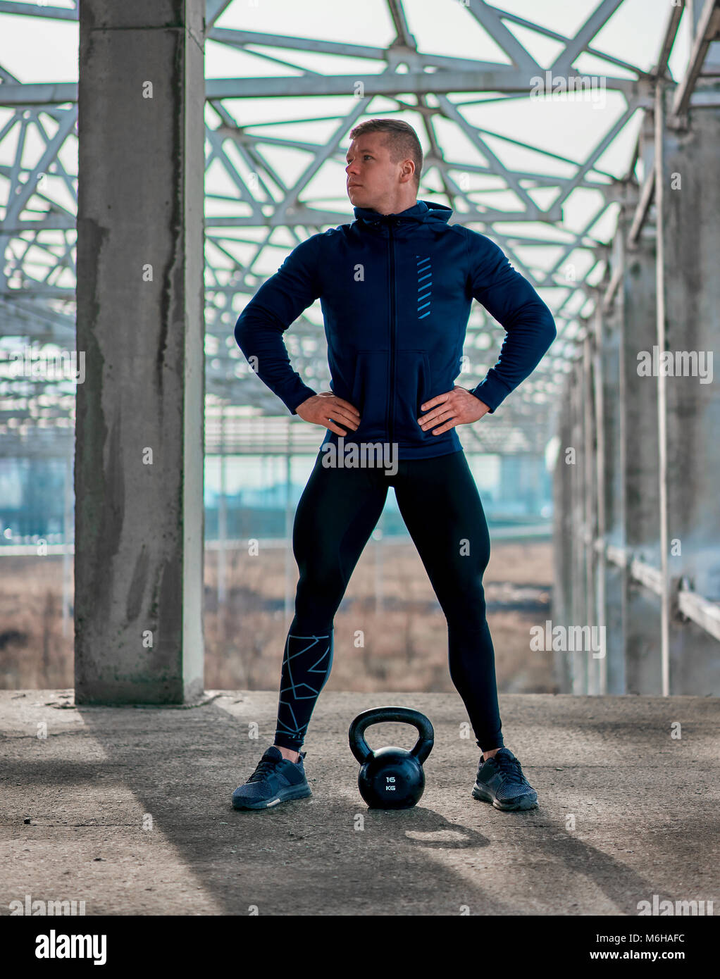 man is engaged in sports at the construction site Stock Photo - Alamy