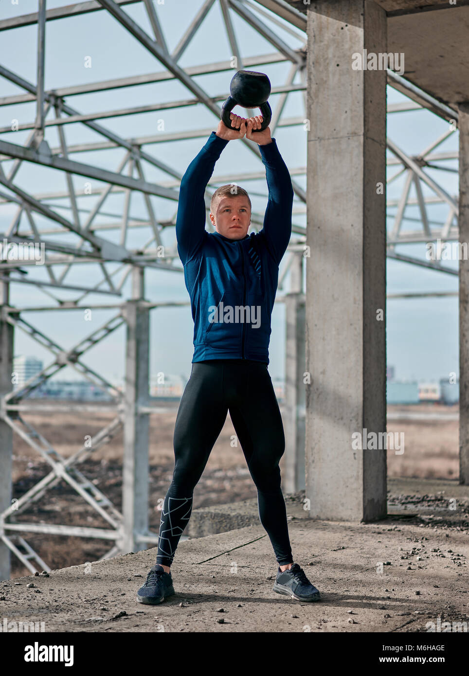 man is engaged in sports at the construction site Stock Photo - Alamy