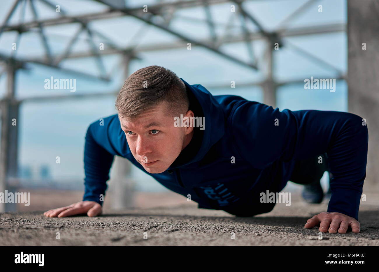man is engaged in sports at the construction site Stock Photo - Alamy