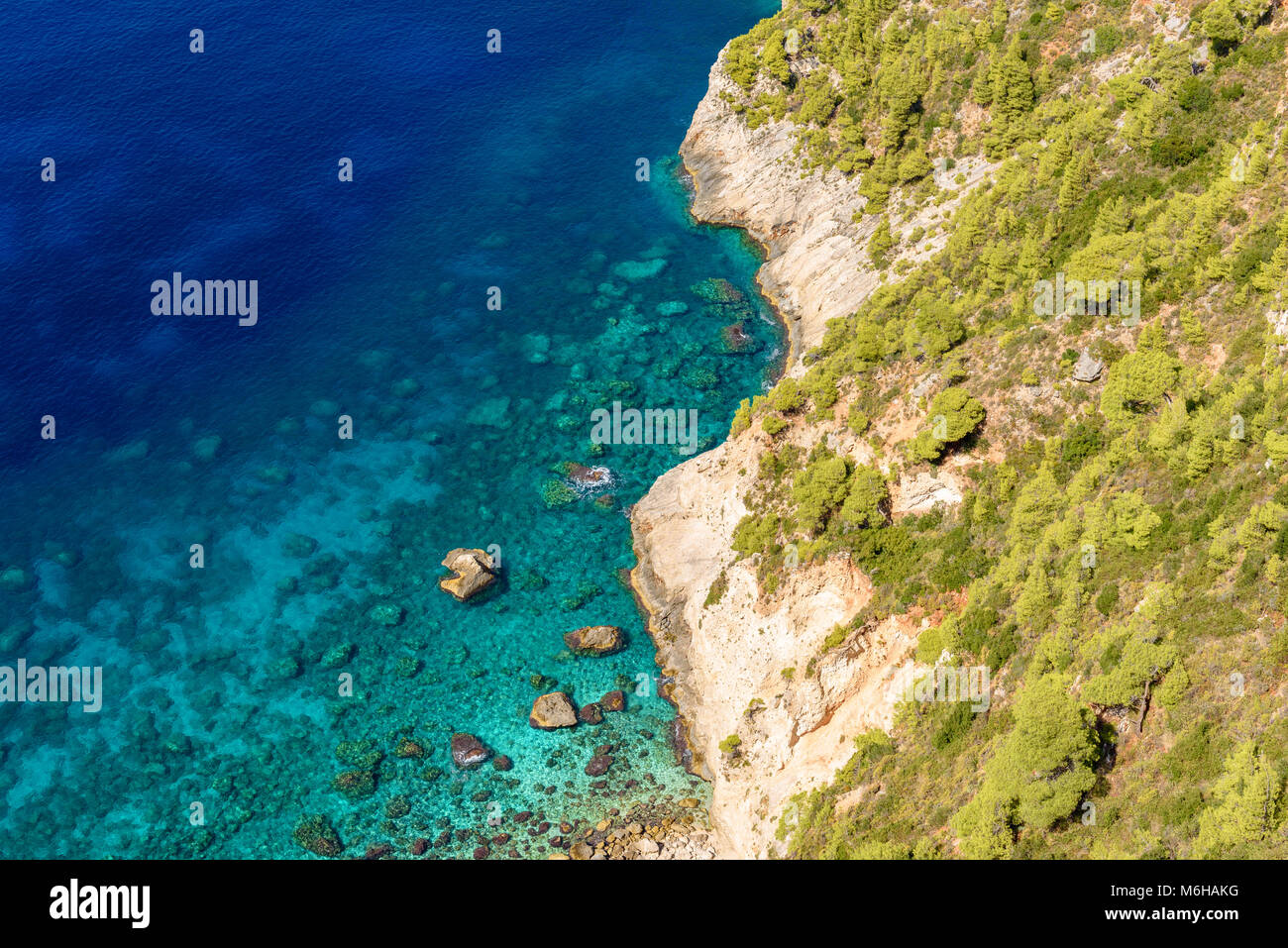 View of beautiful crystal sea water in Porto Schiza on Zakynthos island ...