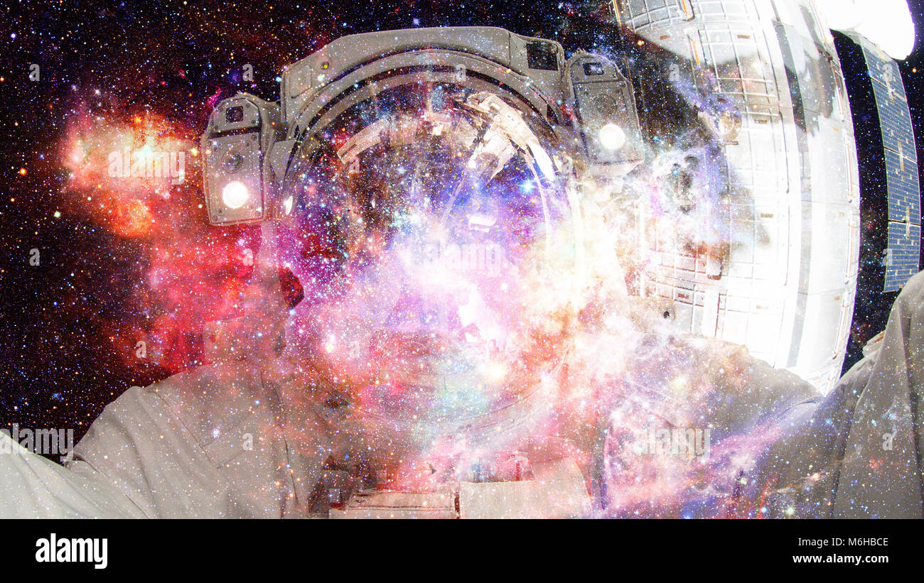 Astronaut in outer space. Science fiction art. Elements of this image ...