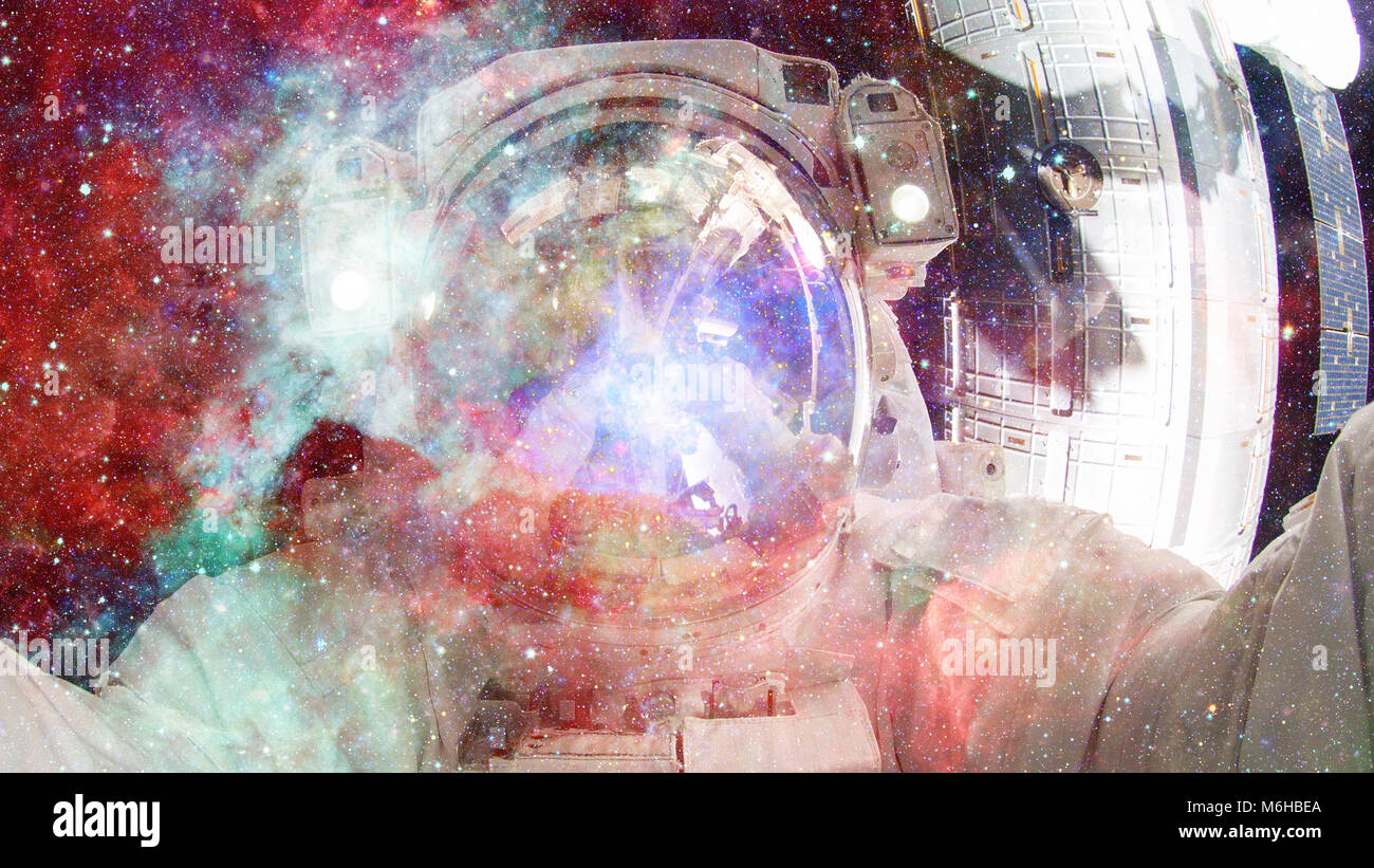 Astronaut in outer space. Science fiction art. Elements of this image ...
