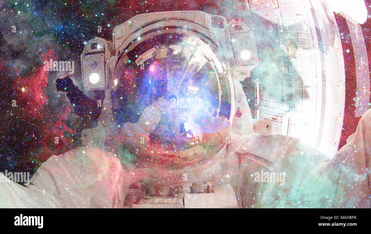 Astronaut in outer space. Science fiction art. Elements of this image ...