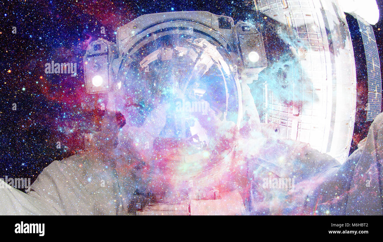 Astronaut in outer space. Science fiction art. Elements of this image ...