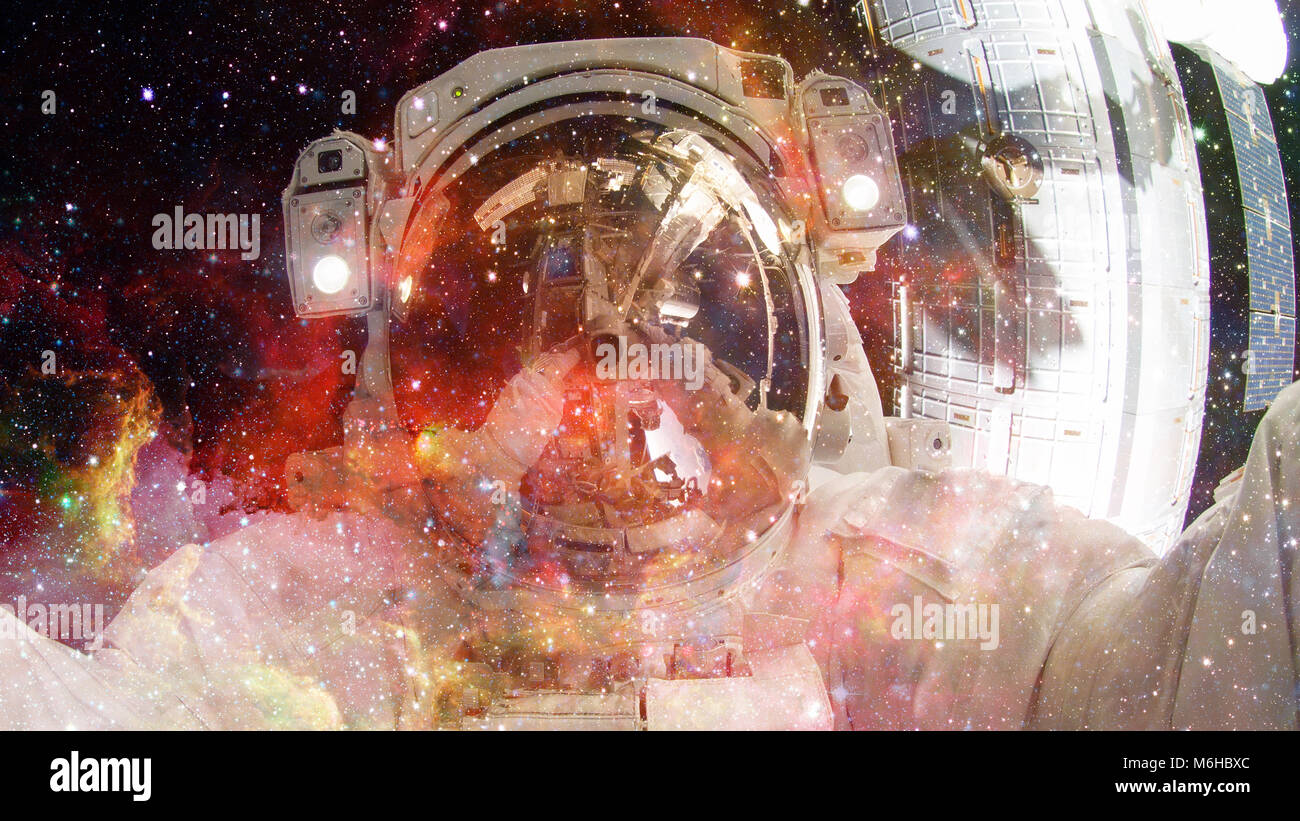 Astronaut in outer space. Science fiction art. Elements of this image ...