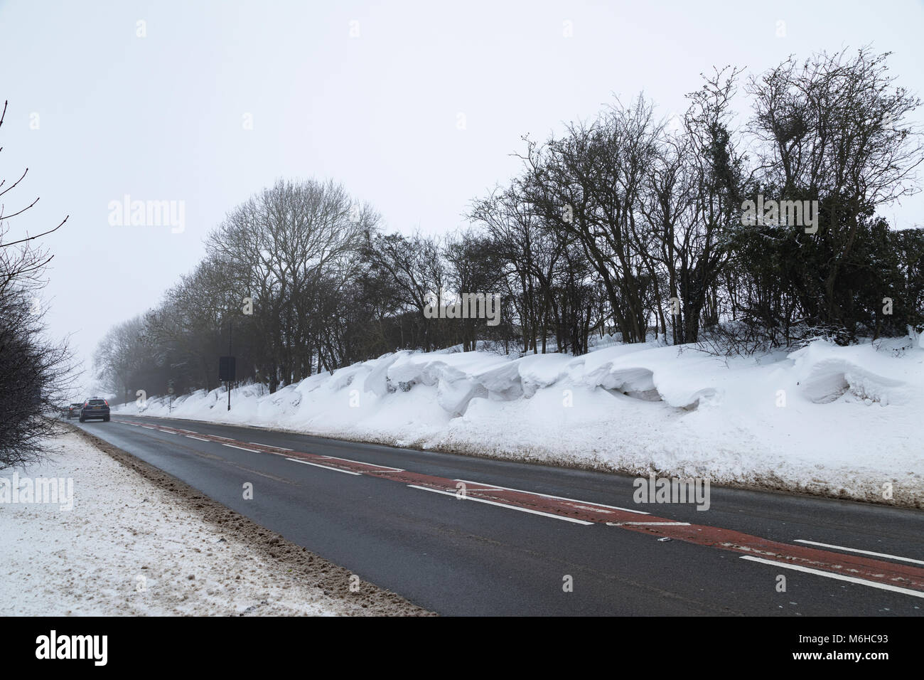 An image showing substantial snowdrifts on a misty bitterly cold day in ...