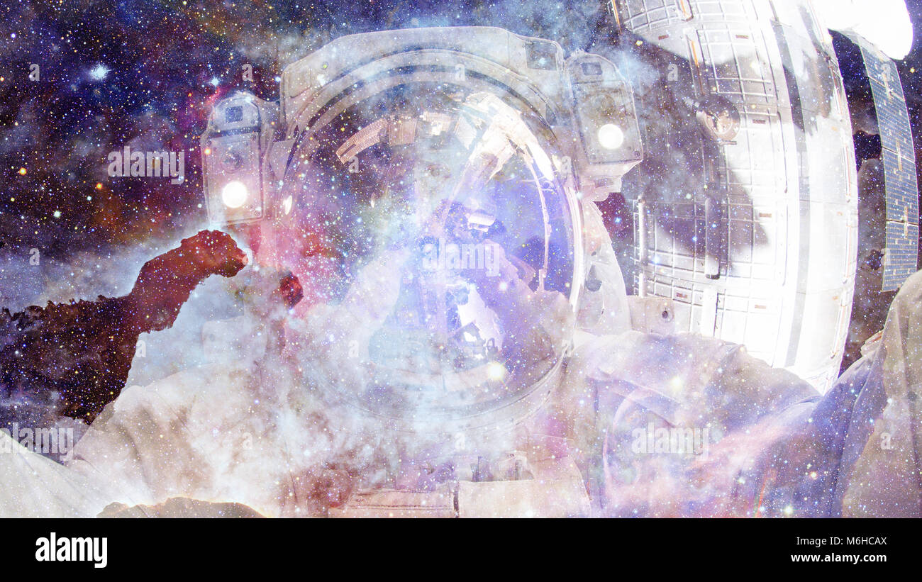 Astronaut in outer space. Science fiction art. Elements of this image ...