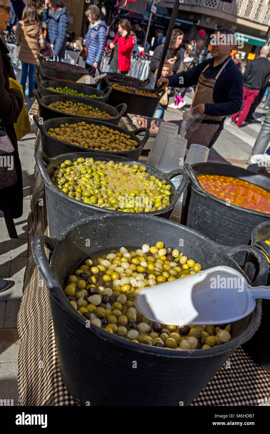 Green olive on the market in the street in town Palamos Stock Photo - Alamy