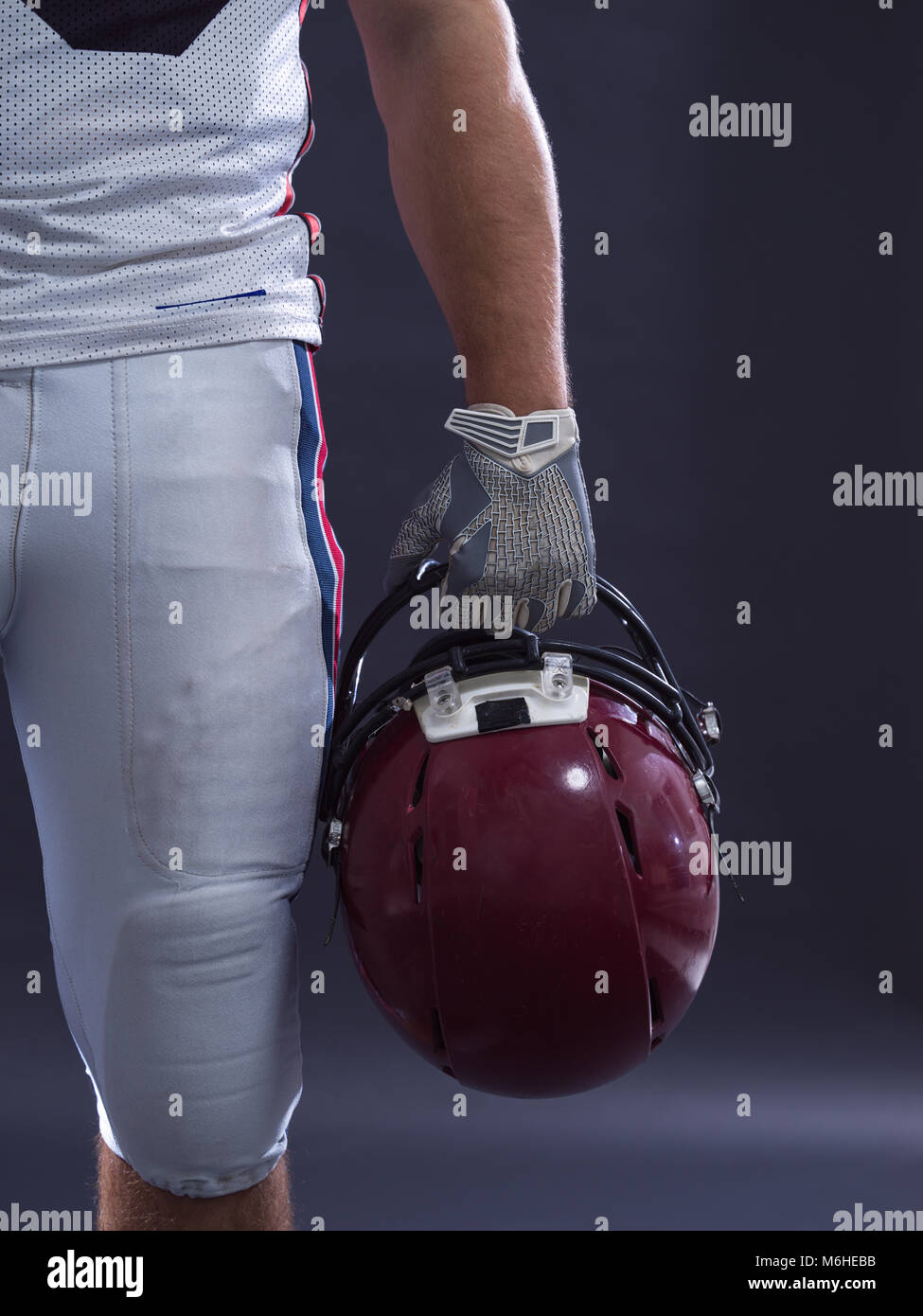 Closeup Portrait of a strong muscular American Football Player isolated ...