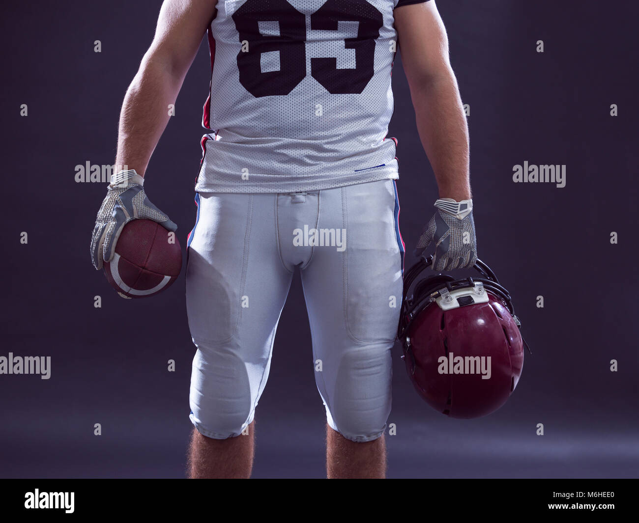Closeup Portrait of a strong muscular American Football Player isolated ...