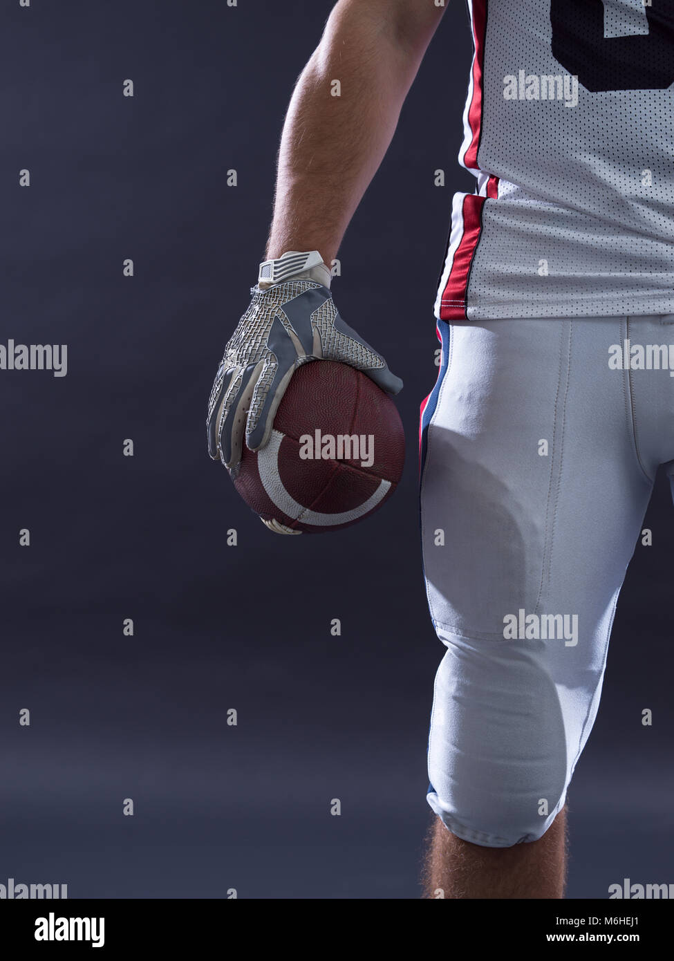 Closeup Portrait of a strong muscular American Football Player isolated ...